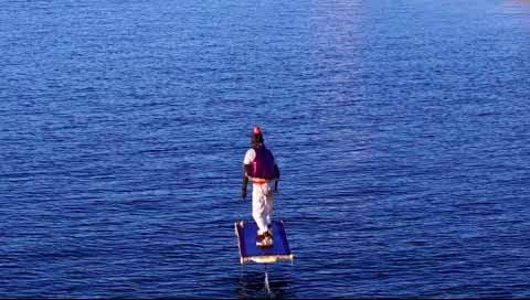 Aladdin Hovering Above The Water