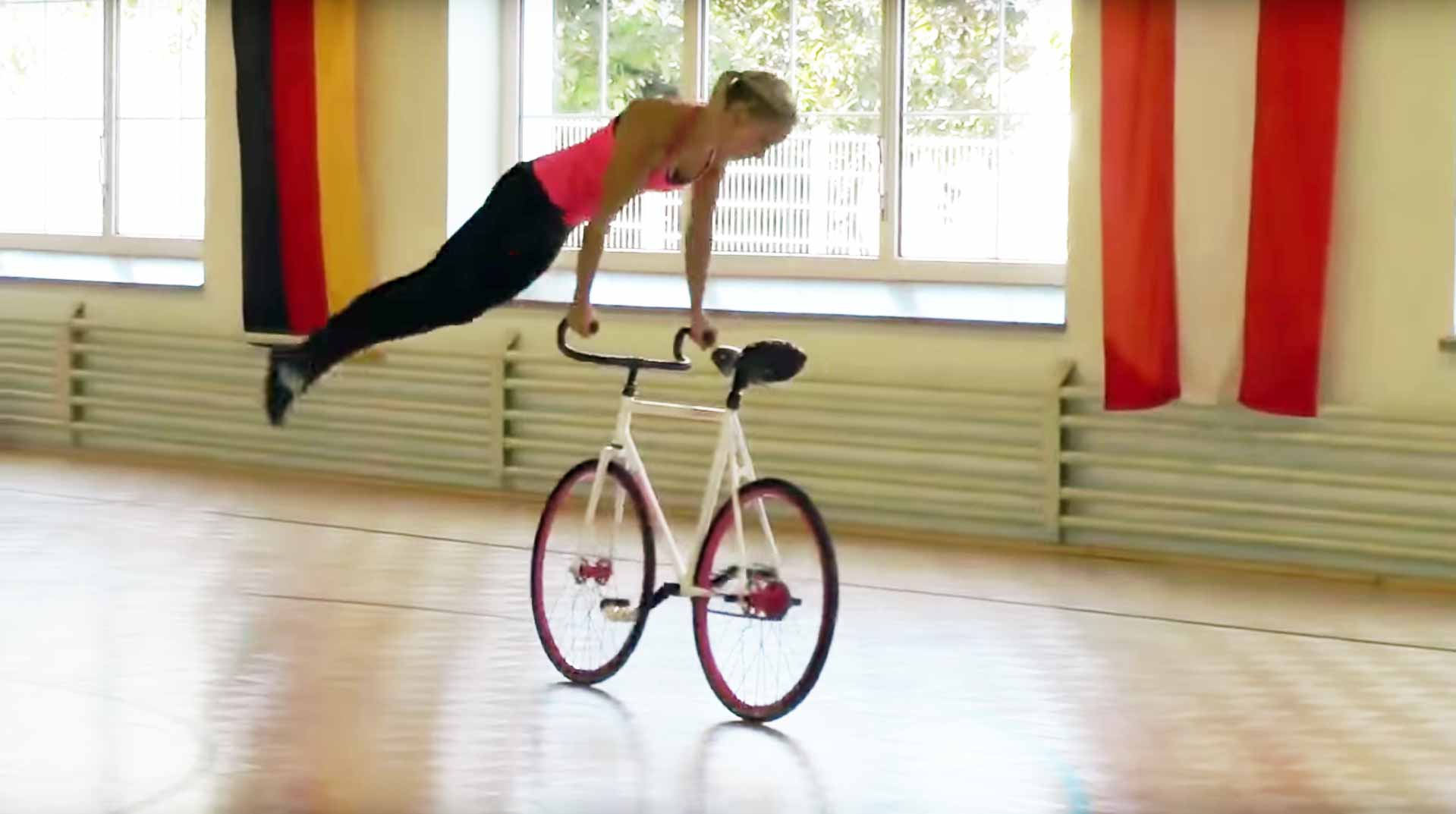 Dancing With A Bicycle - Nicole Frybotova