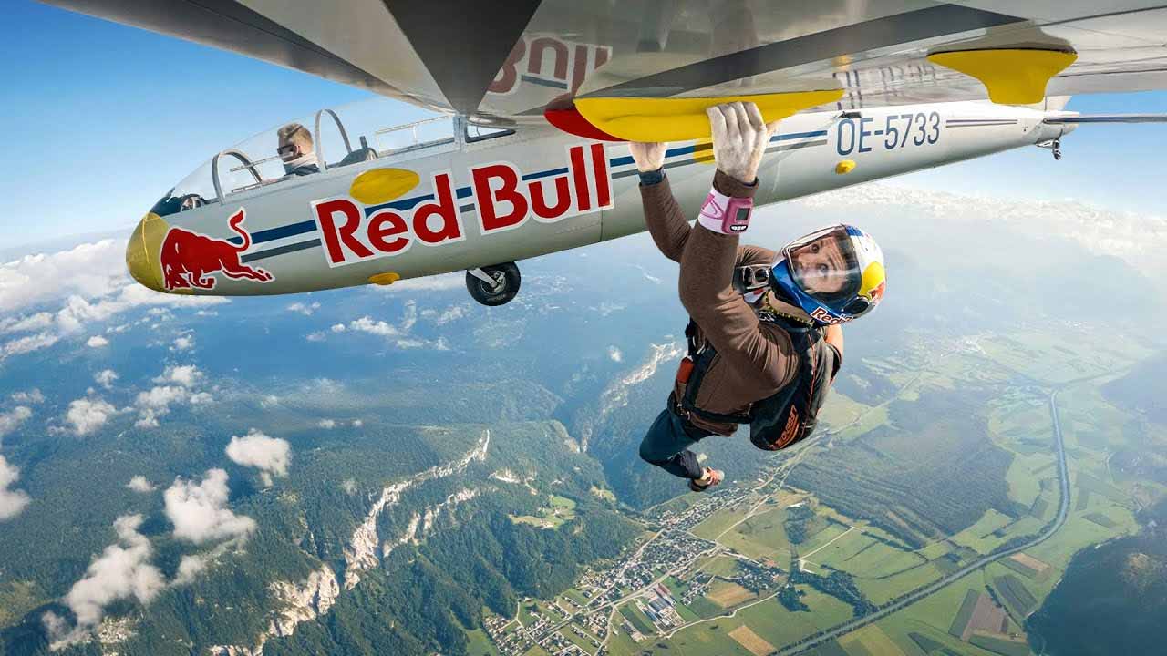 Daring Climb Under a Flying Airplane