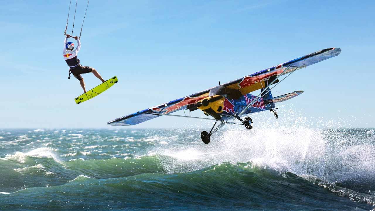 World’s First: Kitesurfer Jumps Over a Flying Plane