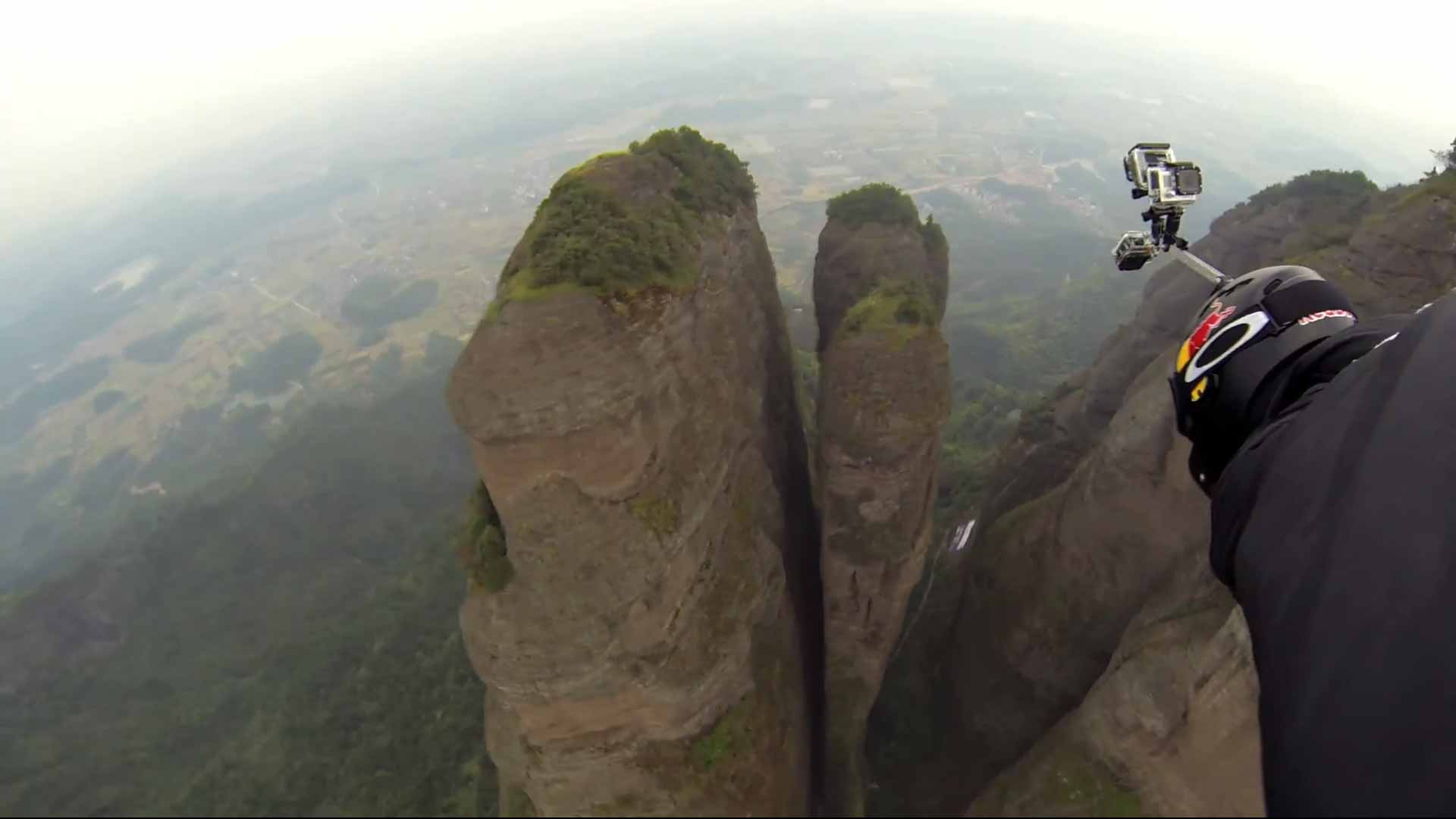 Wrist Cam Footage - Jeb Corliss Flying Through Narrow Mountain Gap In China